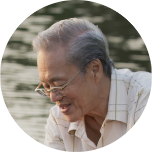 Man looking down while smiling